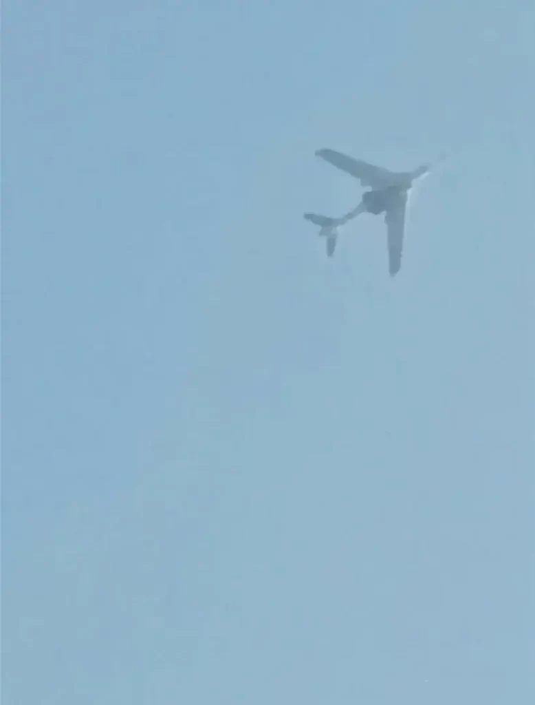 A Chinese Air Force H-6MW bomber was spotted in flight carrying a new and strange object on its ...