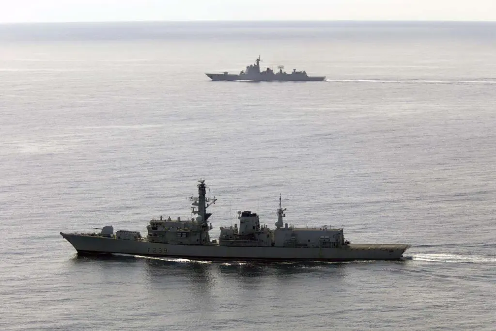 The British frigate HMS Richmond escorted a Type 055 destroyer and a ...