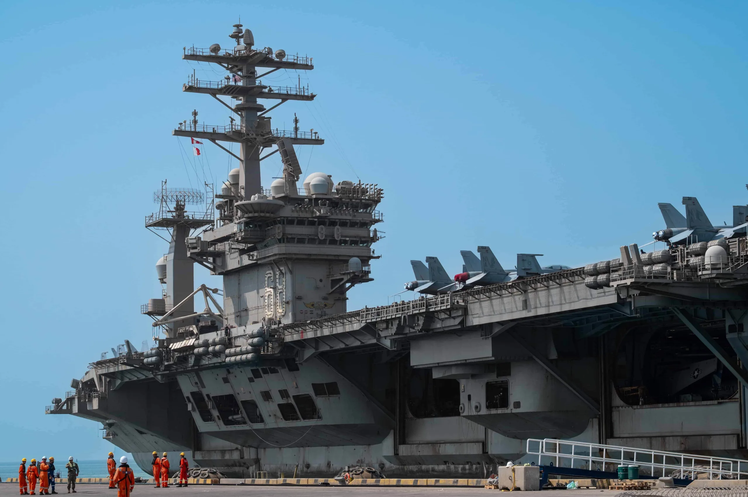 In its final deployment before decommissioning, the nuclear-powered aircraft carrier USS Nimitz ...